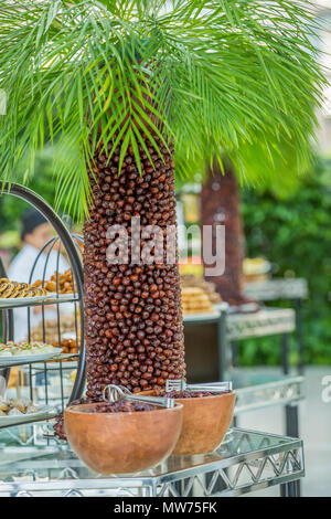 Palm trees made of dates Stock Photo - Alamy