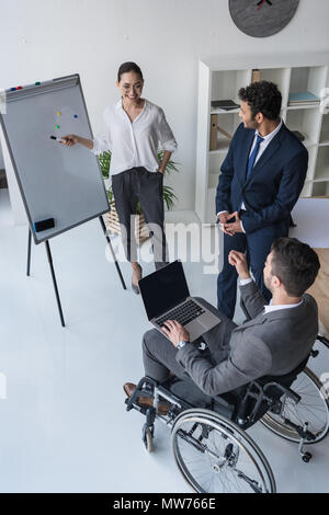 multicultural businesspeople working on new project together in office ...