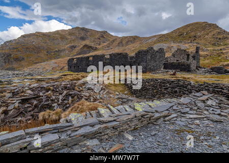 Old ruins of Rhosydd slate quarry quarrymen's barracks with Cnicht ...