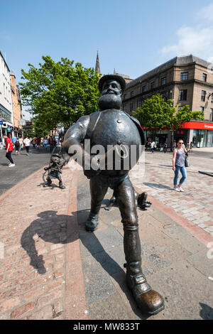 The statue of Desperate Dan in Dundee City Centre alongside a statue of ...