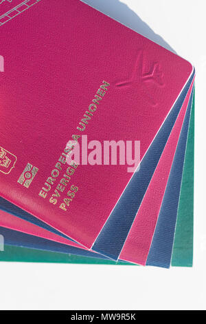 Dark blue US Passport Alongside EU Style Red and Green Passports Stock ...