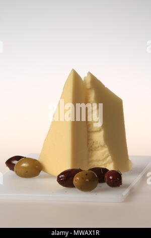 Triangle pieces of cheese next to each other Stock Photo - Alamy