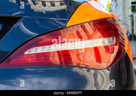 Detail of a modern car LED tail lights on dark background Stock Photo ...