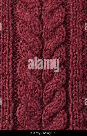 Burgundy knitted pattern textured background Stock Photo - Alamy