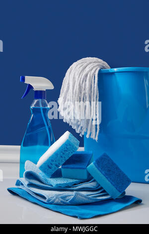 blue rags, bucket and spray for spring cleaning Stock Photo - Alamy