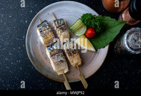 Skewer grilled saba fish with salt set and serve in Japanese style saba ...