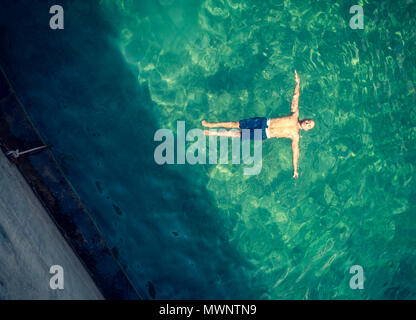 Aerial Top View Male Swimmer Swimming in Swimming Pool. Professional ...