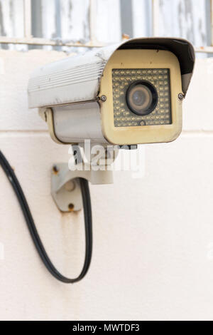 The Old CCTV Security Camera operating long time on wall Stock Photo ...