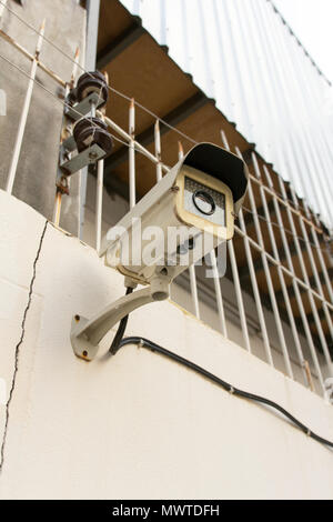 The Old CCTV Security Camera operating long time on wall Stock Photo ...
