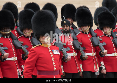 A Sikh member of the Coldstream Guards wearing a turban as he takes ...