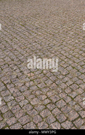 A detailed photo of the square, laid out of modern paving stone with ...