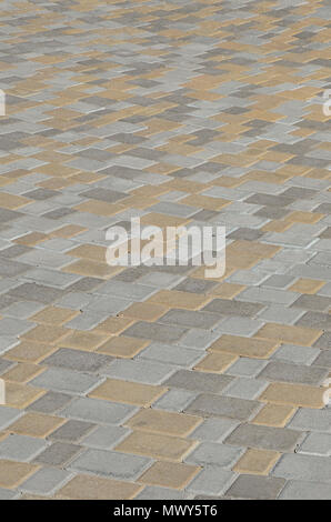 A detailed photo of the square, laid out of modern paving stone with ...