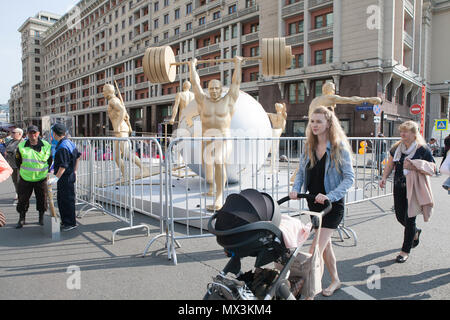 A young mother with a stroller walks through the autumn park Stock ...
