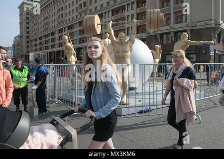 A young mother with a stroller walks through the autumn park Stock ...