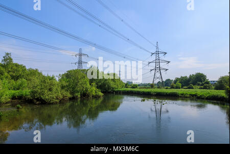 Electric pylons reflected in the River Ribble; Preston; Lancashire ...