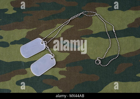 dog tags on russian camouflage uniform background Stock Photo - Alamy