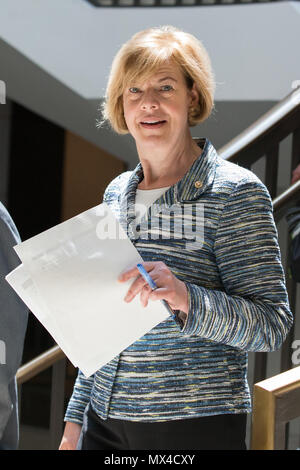 U.S. Senator Tammy Baldwin (D-WI) speaking with reporters near the ...