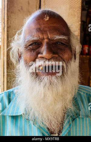 A beautiful portrait of an old South Indian village man or farmer ...
