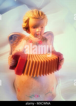 Vintage Carved Wooden Angel Music Box Stock Photo - Alamy