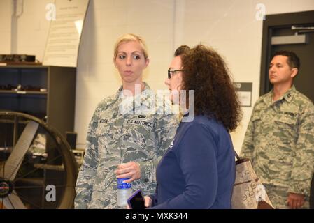 Bethany Butler, from Navy Federal Credit Union, visits with her ...