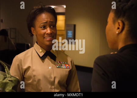 Major Marshalee E. Clarke speaks to a student after the Sister-to ...
