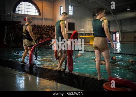 U.S. Marine Corps Instructors of Water Survival (MCWIS), with water ...