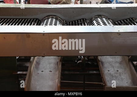 The Fruit sort sizing machine for orange Stock Photo - Alamy