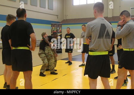 Sgt. Whitney Conder and Sgt. Spenser Mango, both wrestlers with the U.S ...