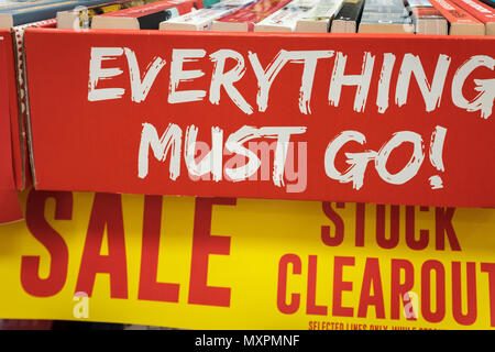 Closing down sale all stock must go sign on shop which has gone out of ...