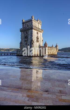 Belem tower and reflection, high tide Stock Photo - Alamy