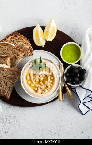 hummus of white cannellini beans, served with arugula pesto and rye ...
