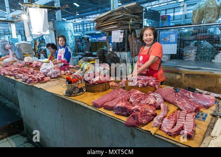 Woman butcher - Thailand meat market. Thai food market. Southeast Asia ...