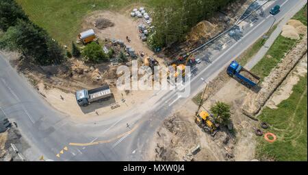 Aerial view of dirt road and roundabout in winter on sunny day Stock ...