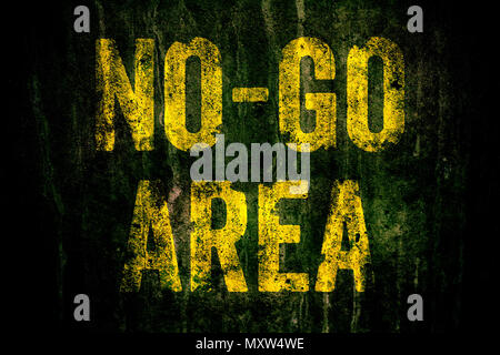 “No-Go Area” warning sign in yellow letters painted on grungy concrete ...