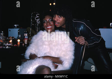 Rick James visits Mary Wilson backstage before her performance at the ...