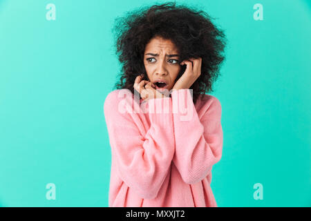 Image of a confused displeased emotional young pretty woman student ...