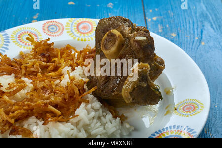 Qozi Lamb - Traditional Middle Eastern rice cooked with peas, carrots ...