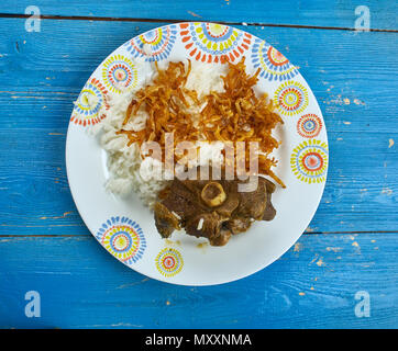Qozi Lamb - Traditional Middle Eastern rice cooked with peas, carrots ...