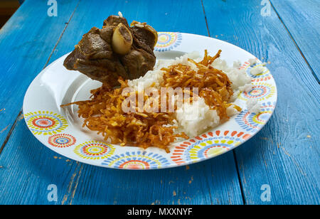 Qozi Lamb - Traditional Middle Eastern rice cooked with peas, carrots ...
