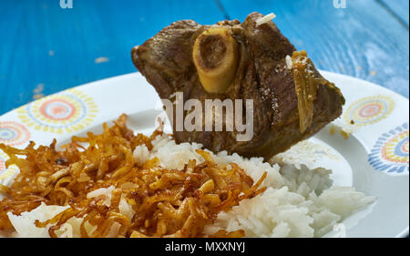 Qozi Lamb - Traditional Middle Eastern rice cooked with peas, carrots ...