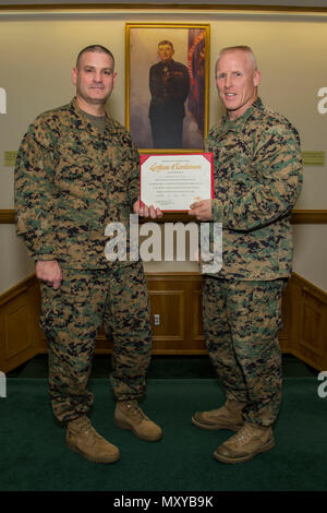 Maj. Gen. Thomas Weidley (left) speaks with Sgt. Maj. Anthony Spadaro ...