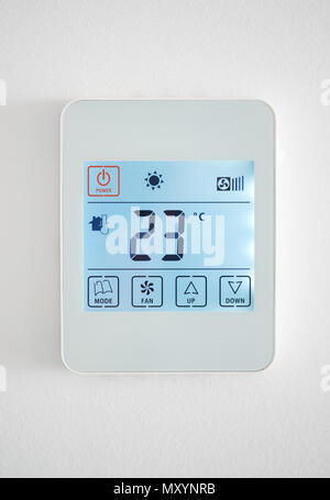 Wall-mounted digital climate control, home thermostat that controls a ...