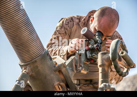 U.S. Marines fire an M327 120mm towed mortar system during a ...