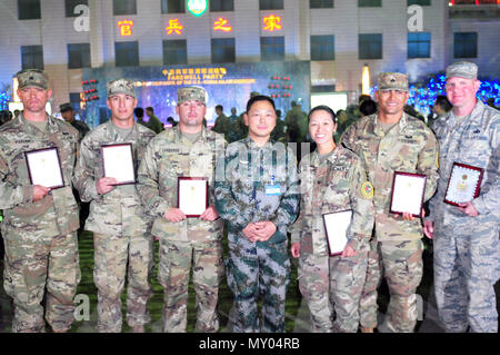 Col. Danielle Ngo, commander of the 130th Engineer Brigade, passes the ...