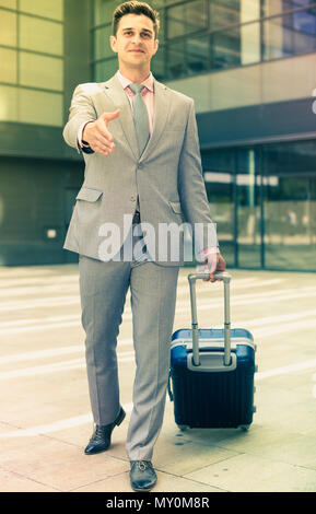 Businessman stretching open hand offering handshake and inviting to ...