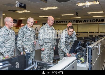 Maj. Gen. Christopher Weggeman, 24th Air Force commander, poses with Mr ...