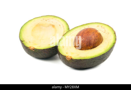 Fresh avocado huss is cut into two halves on a white background Stock ...