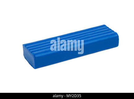 A piece of blue plasticine on a white background. Creatively for ...