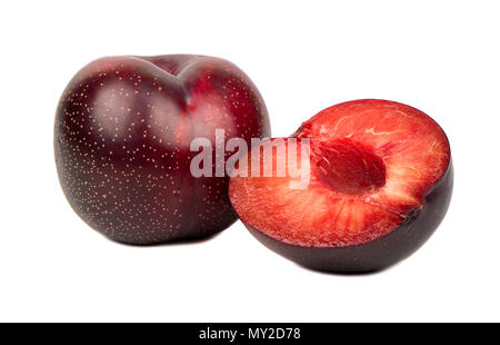 Fresh big red plum with a juicy half on white background Stock Photo ...