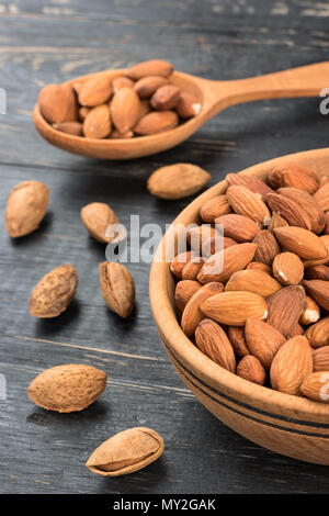 Walnuts scattered on a dark background, macro Stock Photo - Alamy